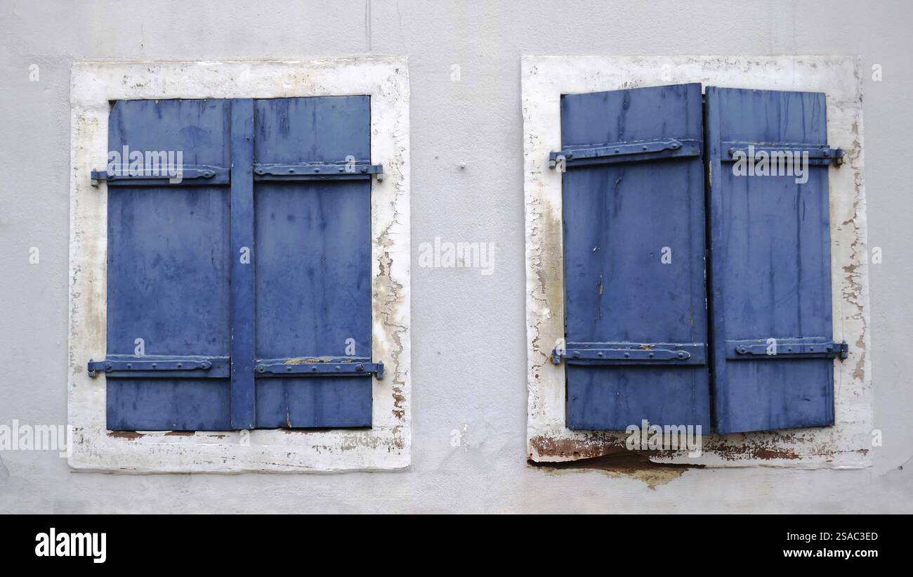 Window with closed blue shutters Stock Photo - Alamy