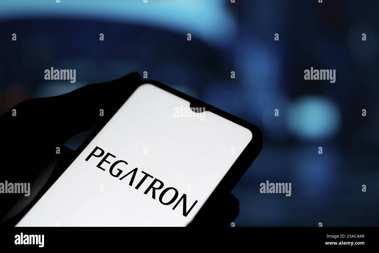 Pegatron logo is displayed on smartphone. PEGATRON Corporation is a ...