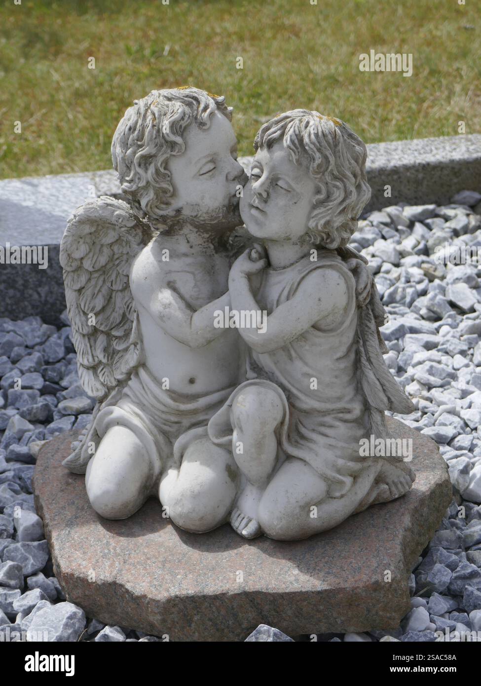 Two ditch angels embrace Stock Photo - Alamy
