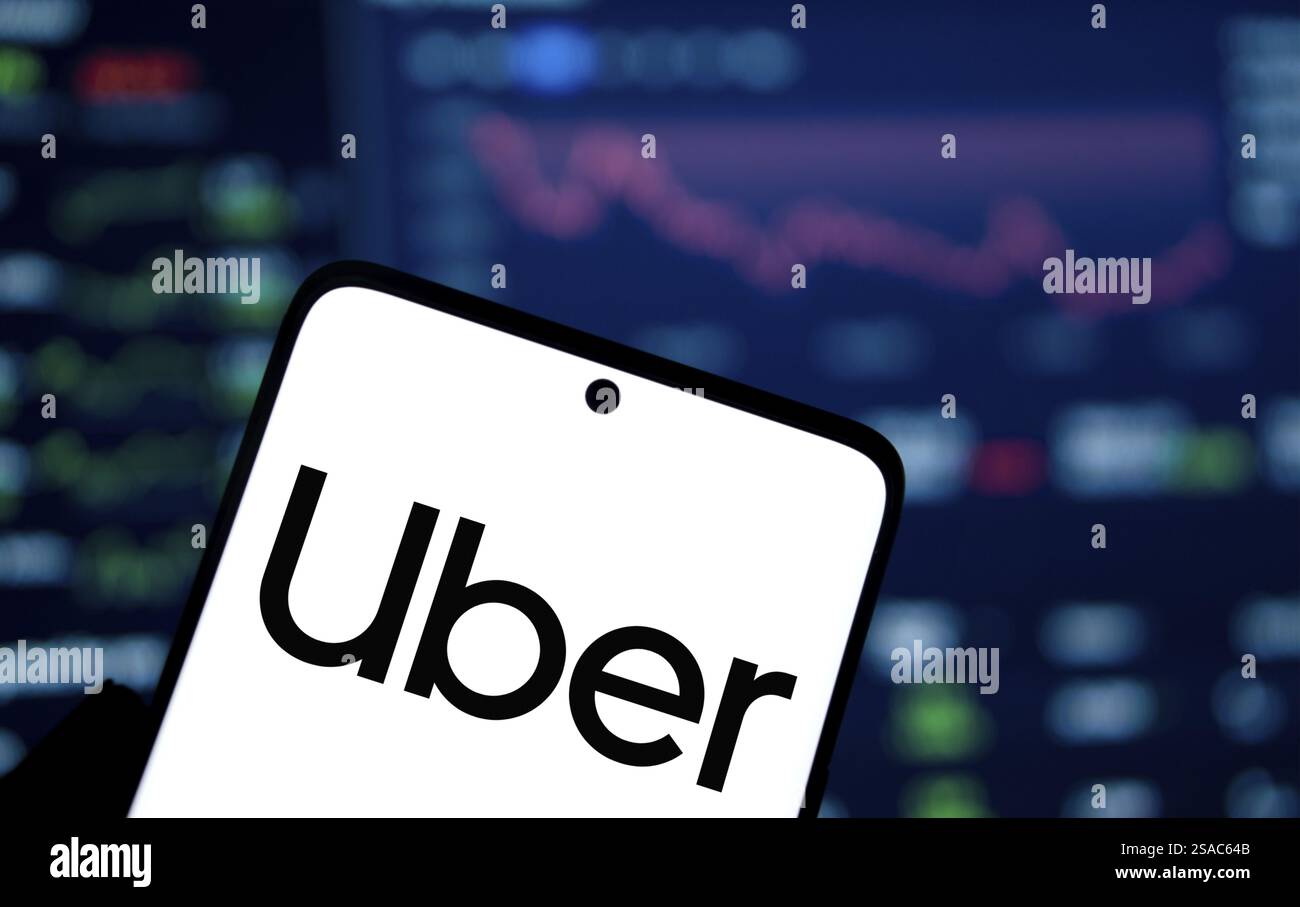uber logo is displayed on smartphone. Uber Technologies, Inc. is an American multinational ...