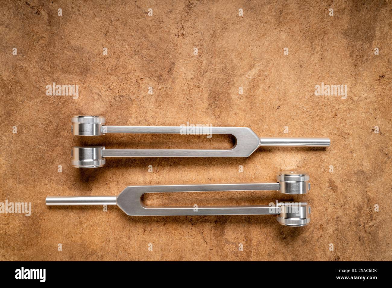weighted metal tuning forks used for tuning musical instruments, sound ...