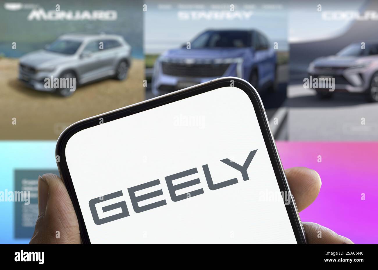 Geely logo is displayed on smartphone. Zhejiang Geely Holding Group Co ...