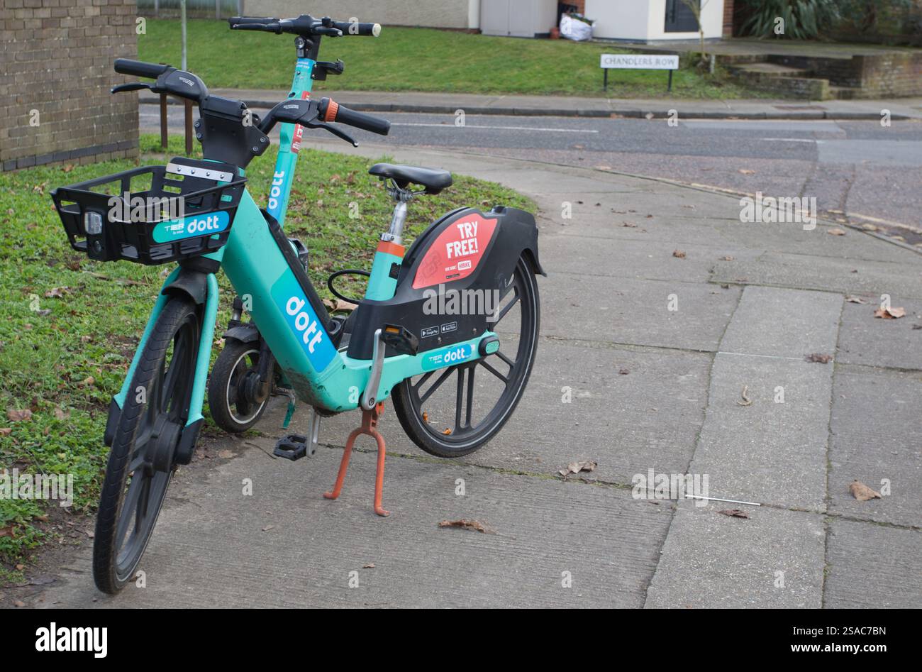 Dott e-bike and e-scooter left on the pavement in Essex. Dott bikes, formerly Tier, are being ...