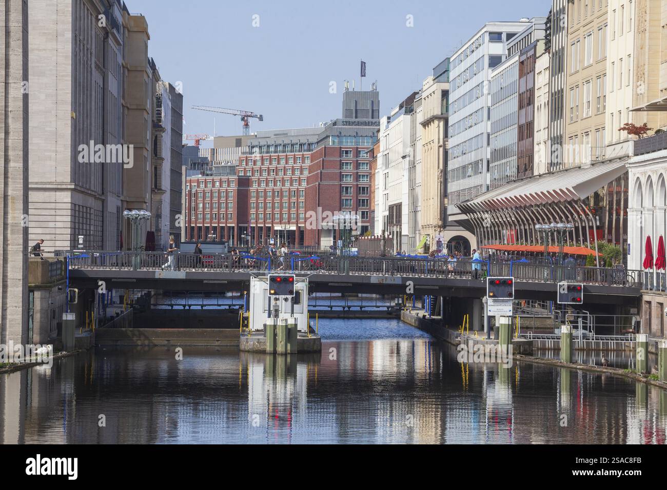 Lock bridge with town hall lock on the Alsterfleet, Hamburg, Germany ...