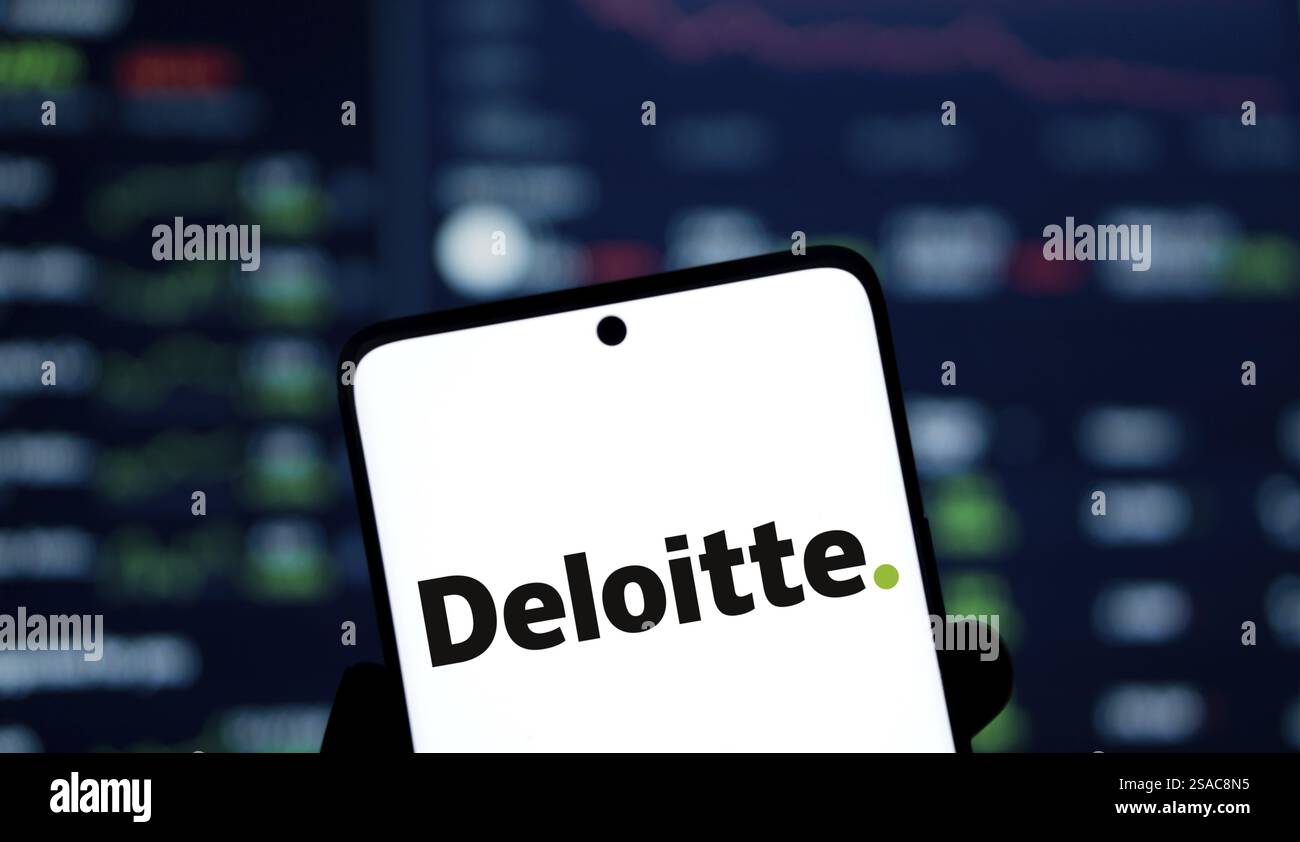 Deloitte logo is displyed on smartphone. Deloitte is a multinational ...