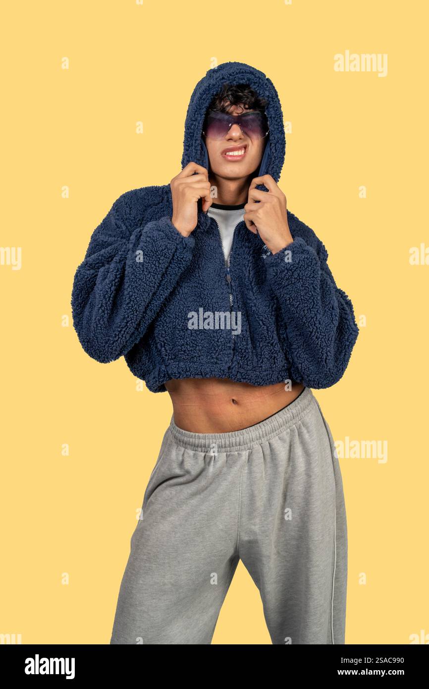 Person wearing blue hoodie hi-res stock photography and images - Alamy