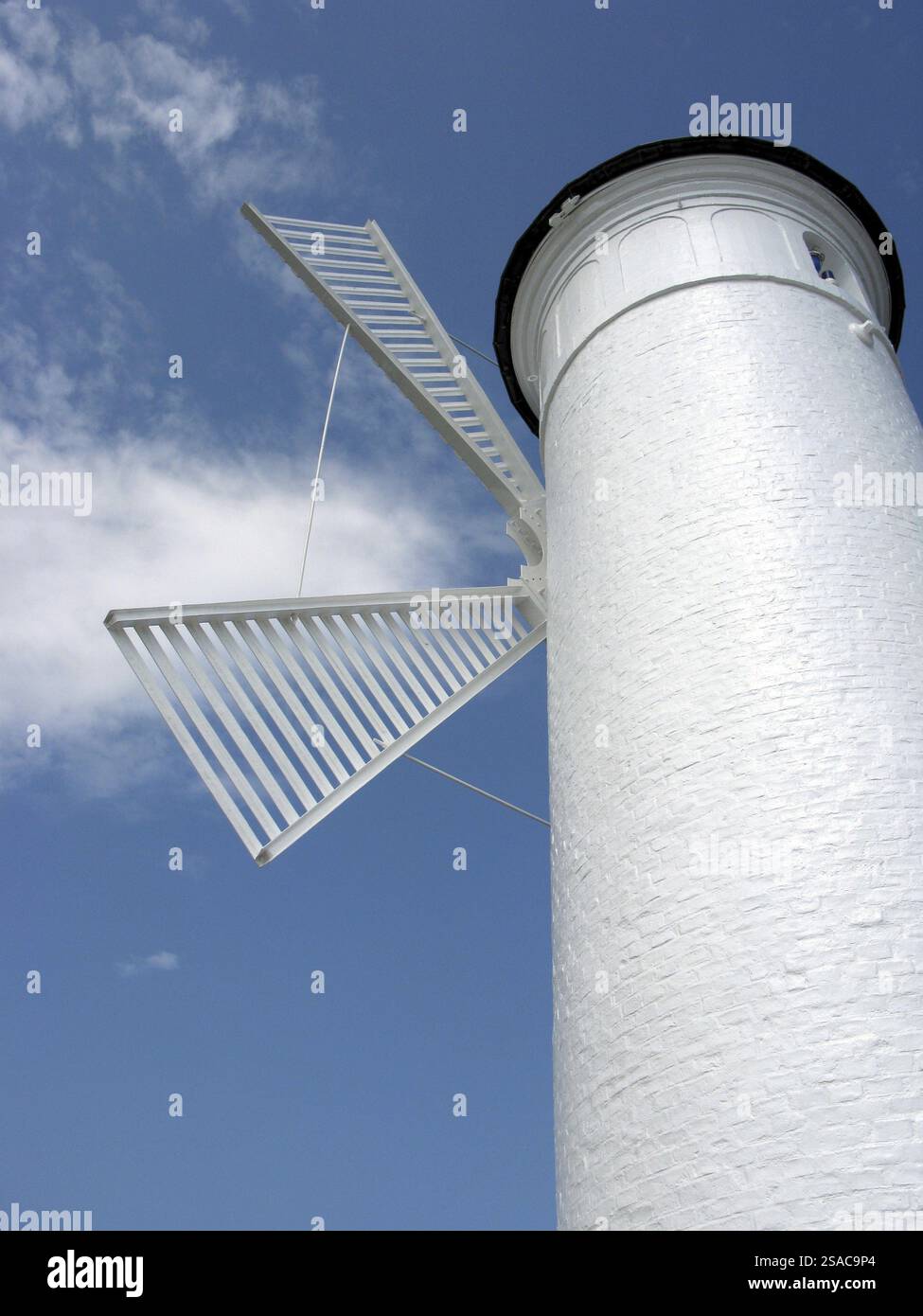 The landmark of Swinoujscie: a white lighthouse in the shape of a mill ...