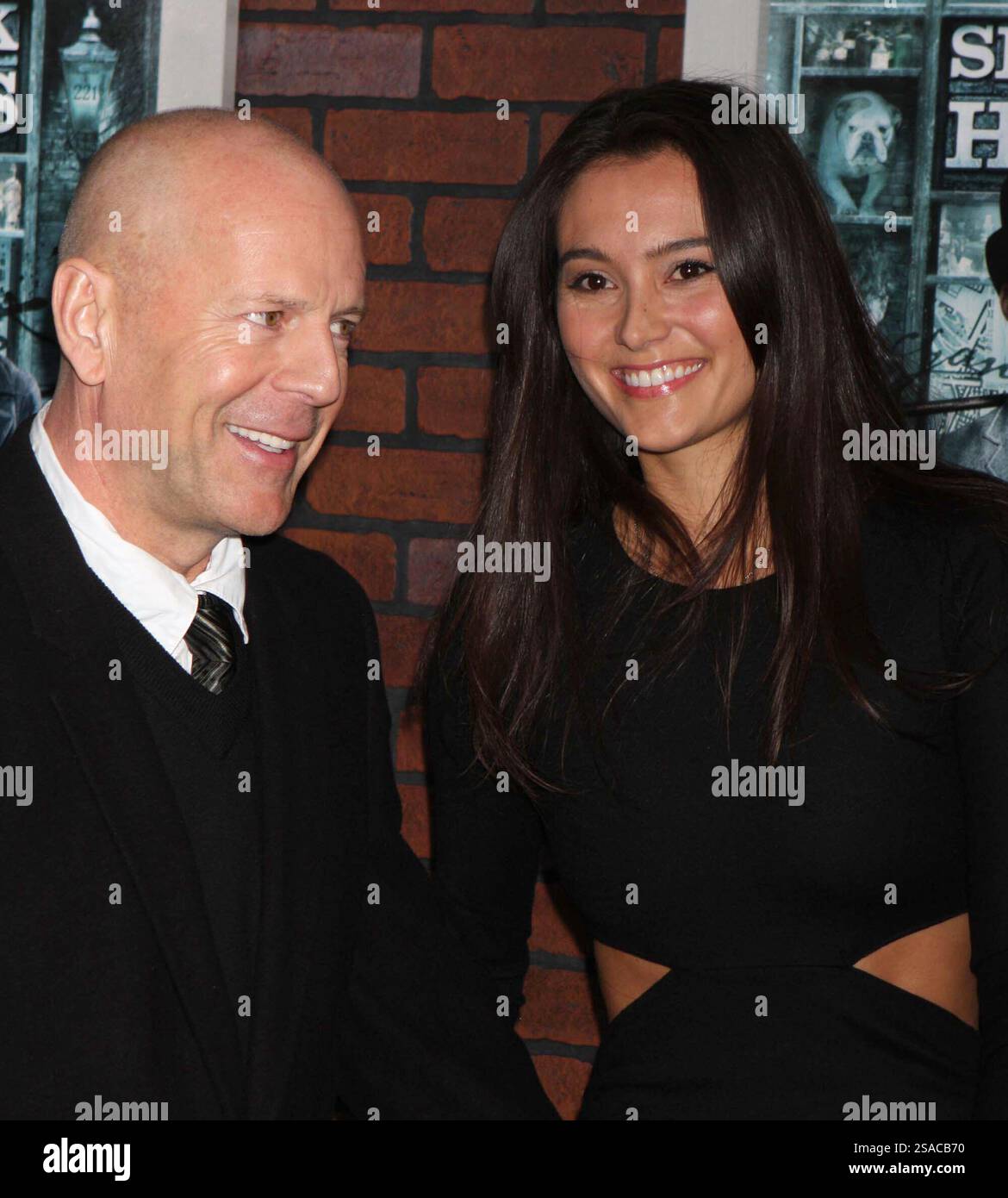 Bruce Willis and Emma Heming attend the premiere of Warner Bros ...