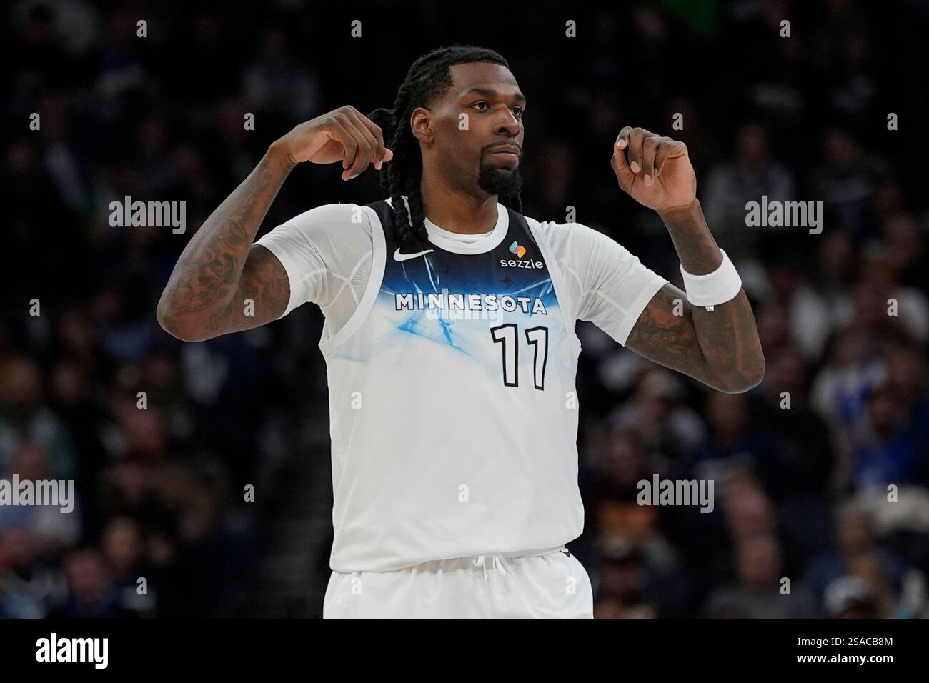 Minnesota Timberwolves center Naz Reid (11) stands on the court during ...