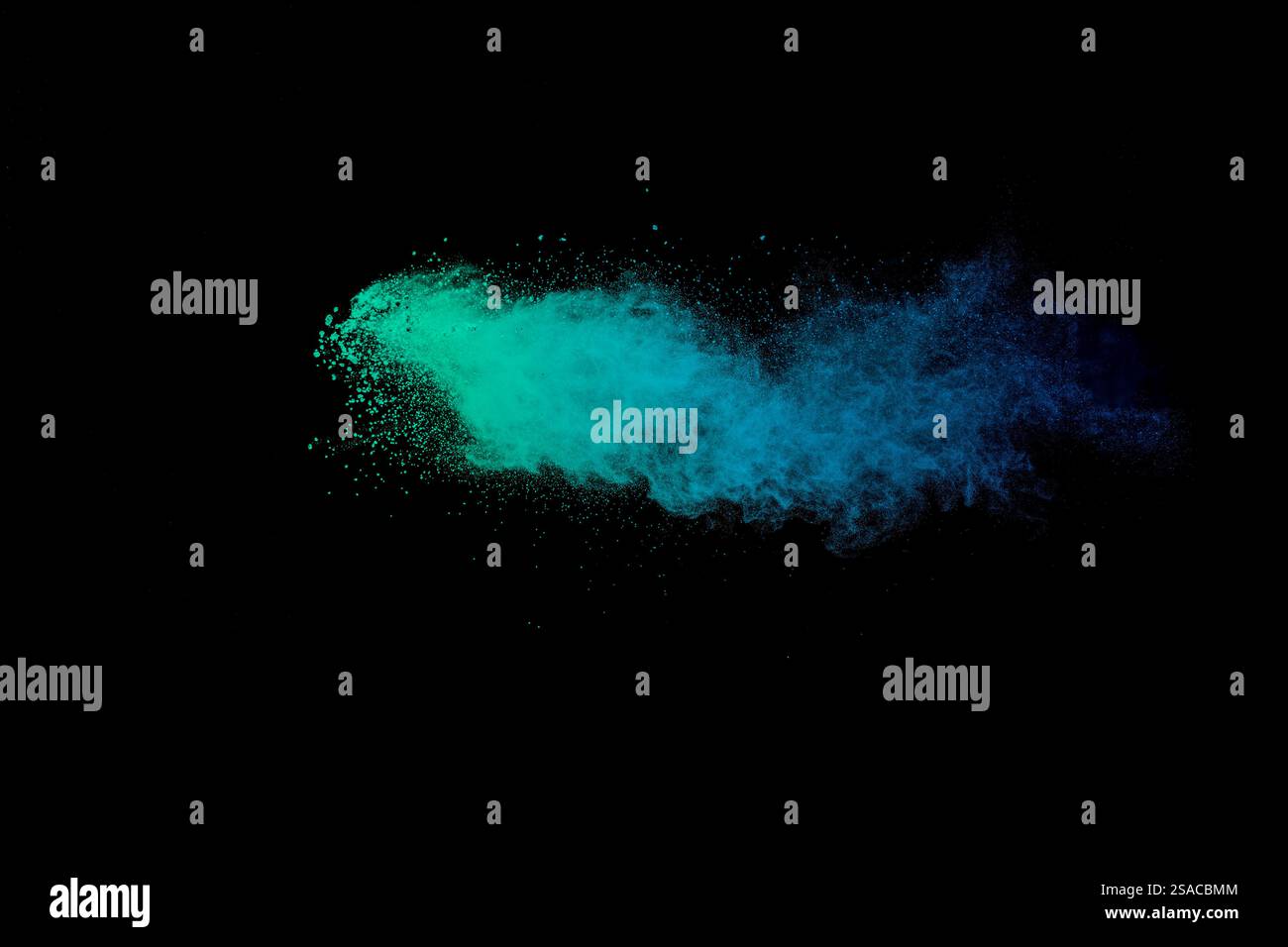 Blue and green explosion of powdery dust Stock Photo - Alamy