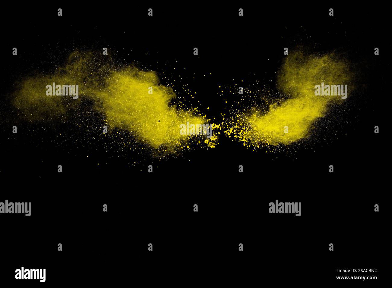 Pair of yellow powdery wings in the air, surrounded by a cloud of ...