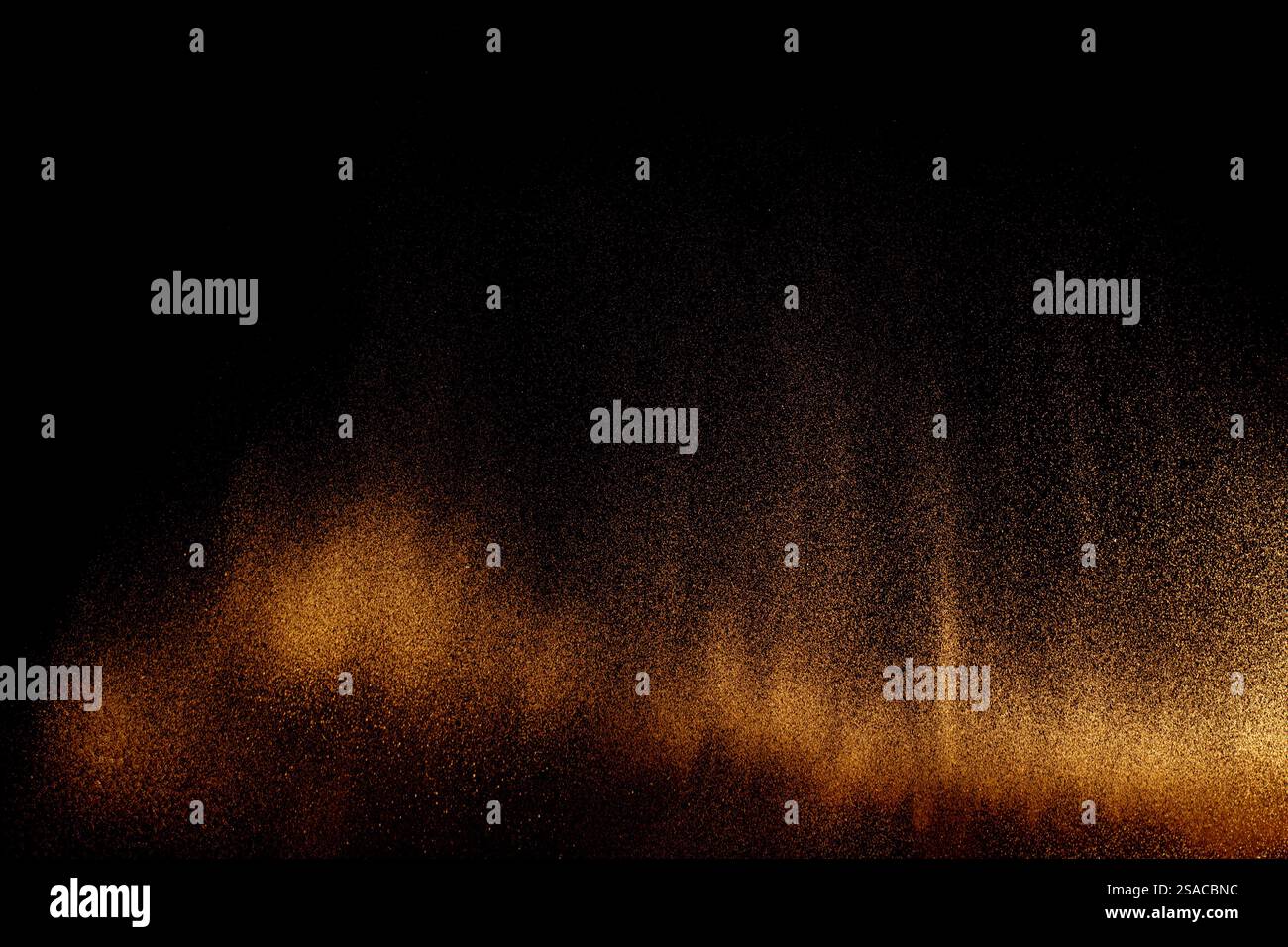 Sand flying explosion isolated on black background ,throwing freeze ...