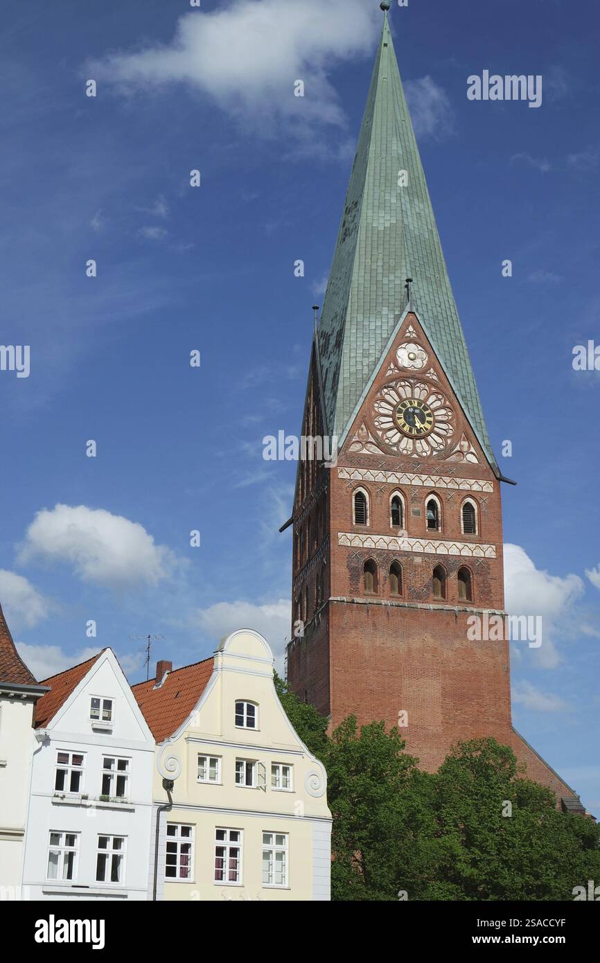 Church tower and gabled houses, Lueneburg Stock Photo - Alamy