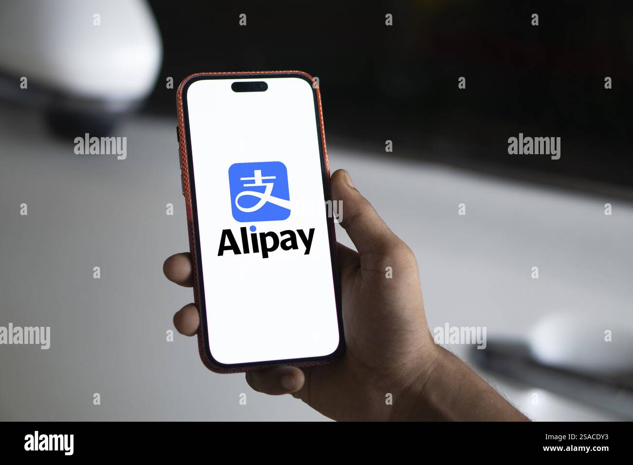 Alipay logo is displayed on smartphone. Alipay is a online payment platform owned by Alibaba ...