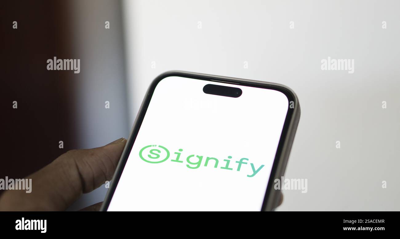 Signify logo is displayed on smartphone. Signify N.V. is a Dutch ...