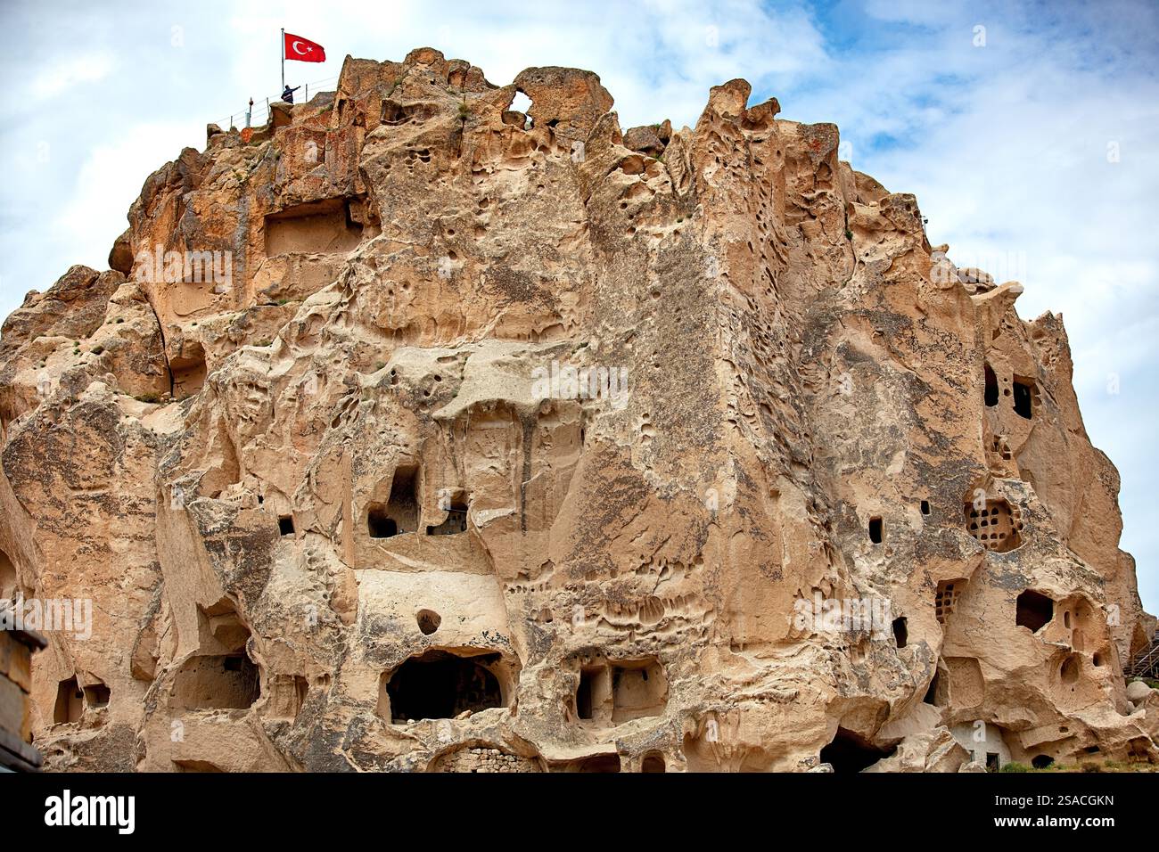Exploring the ancient rock formations and cave dwellings in Cappadocia ...