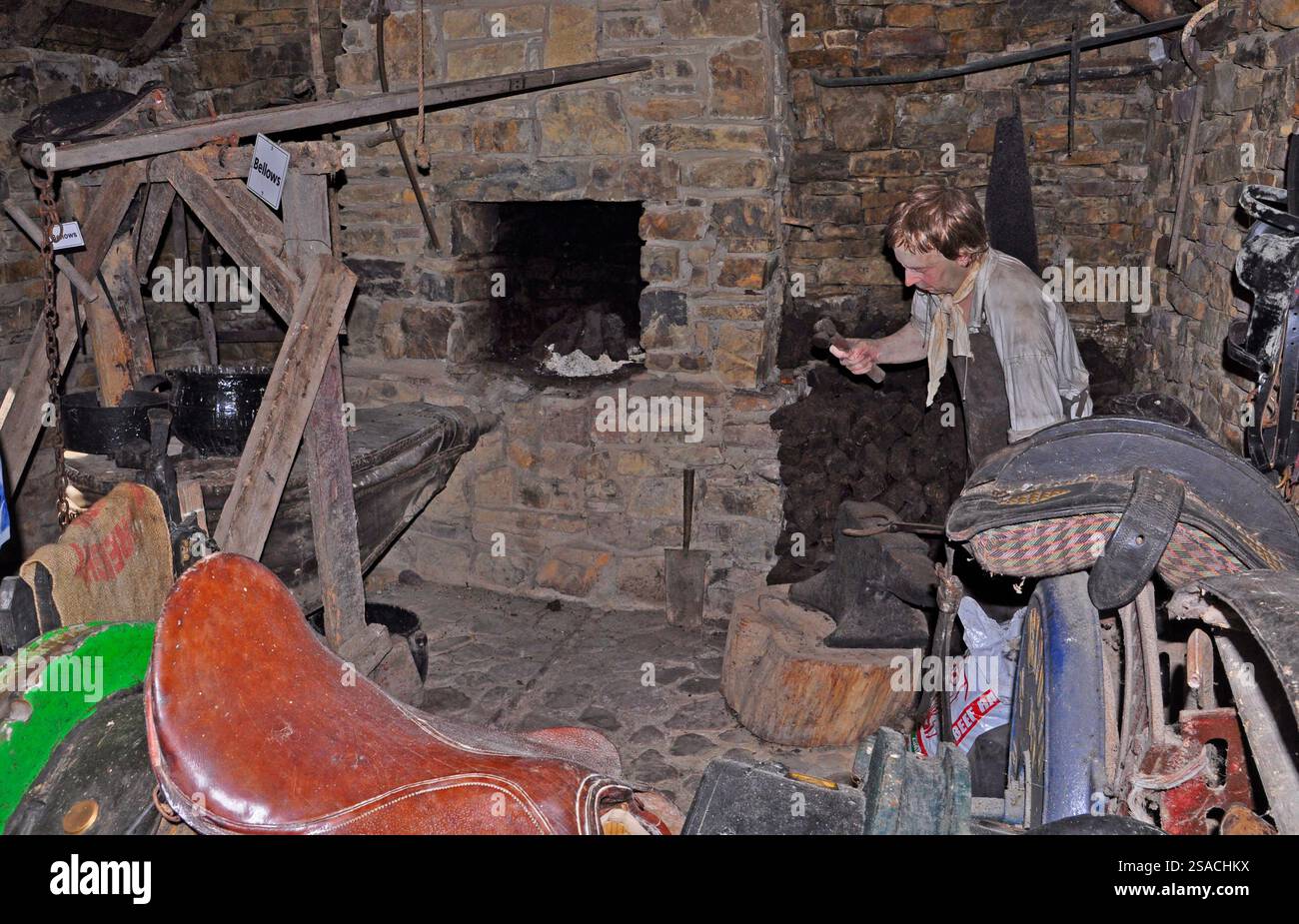 A display showing the model of a farrier working at the peat fired ...