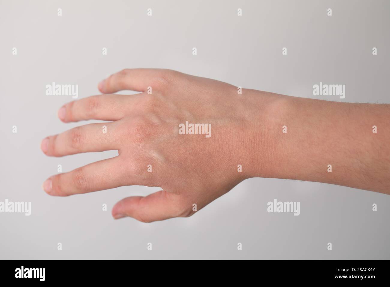 Woman with visible hand veins on light grey background, closeup Stock Photo - Alamy