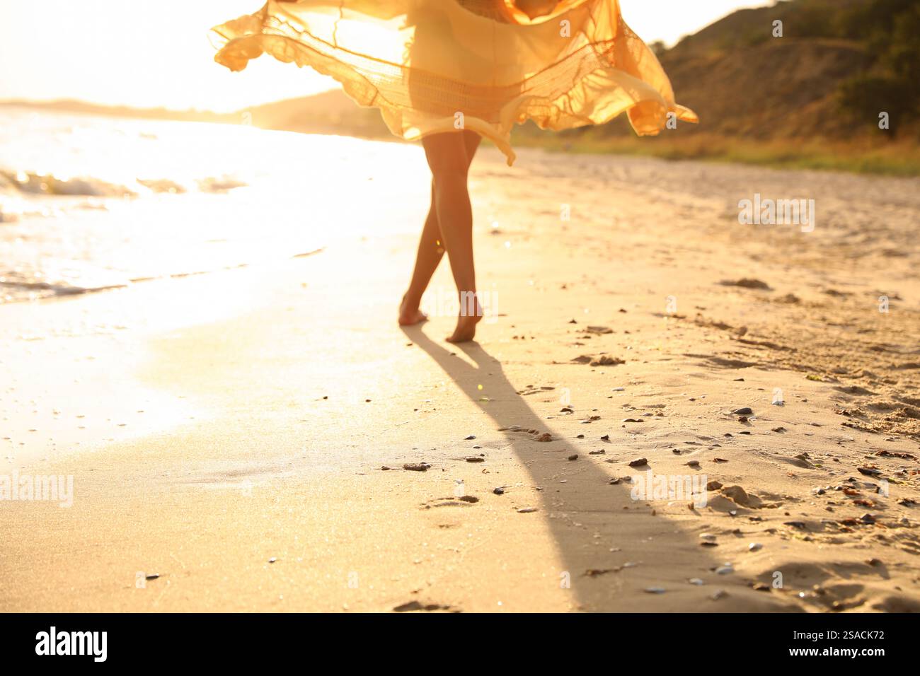 Female legs walking on beach hi-res stock photography and images - Alamy