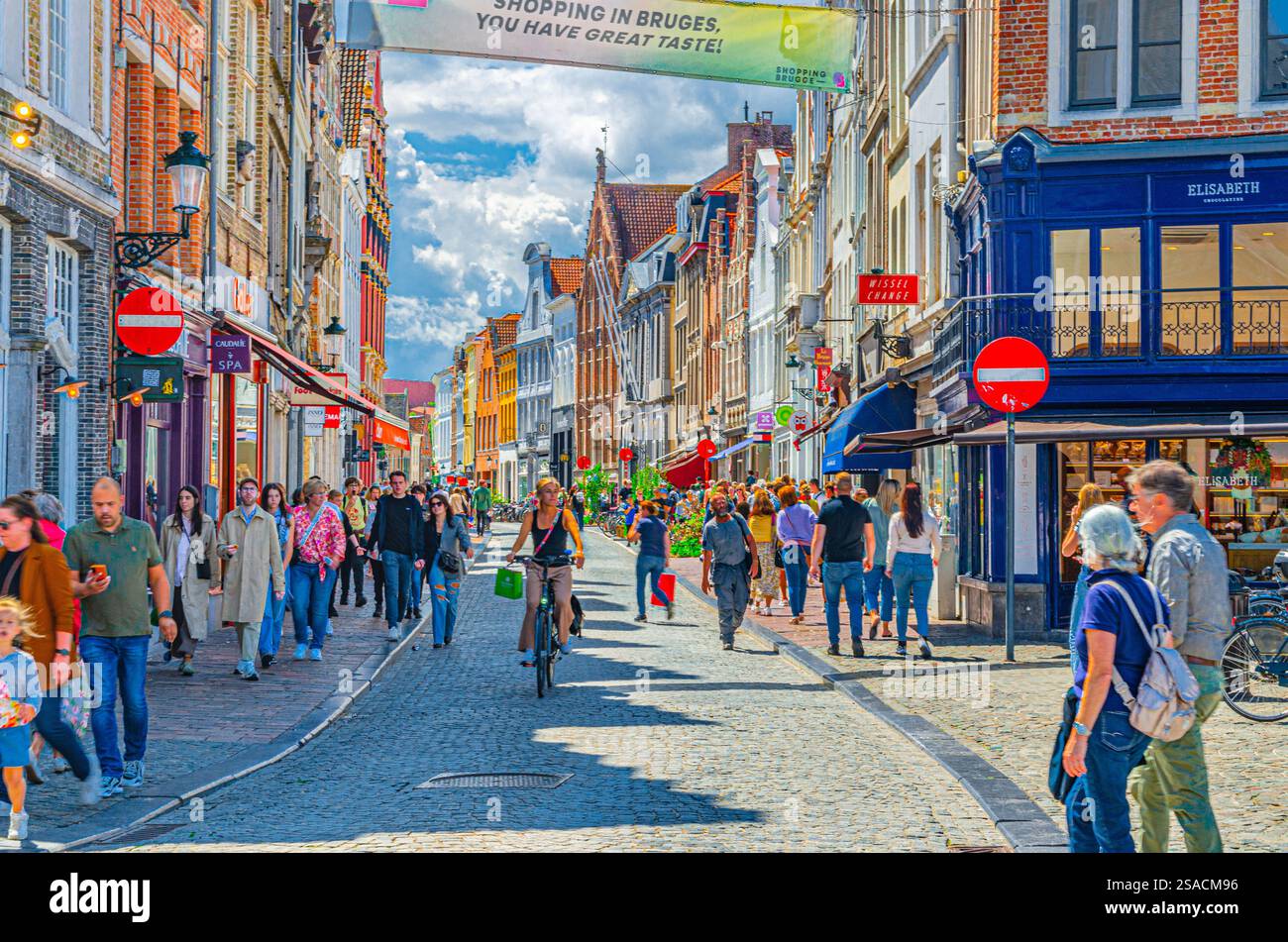 Bruges, Belgium, July 5, 2023: crowd of many people walking down ...