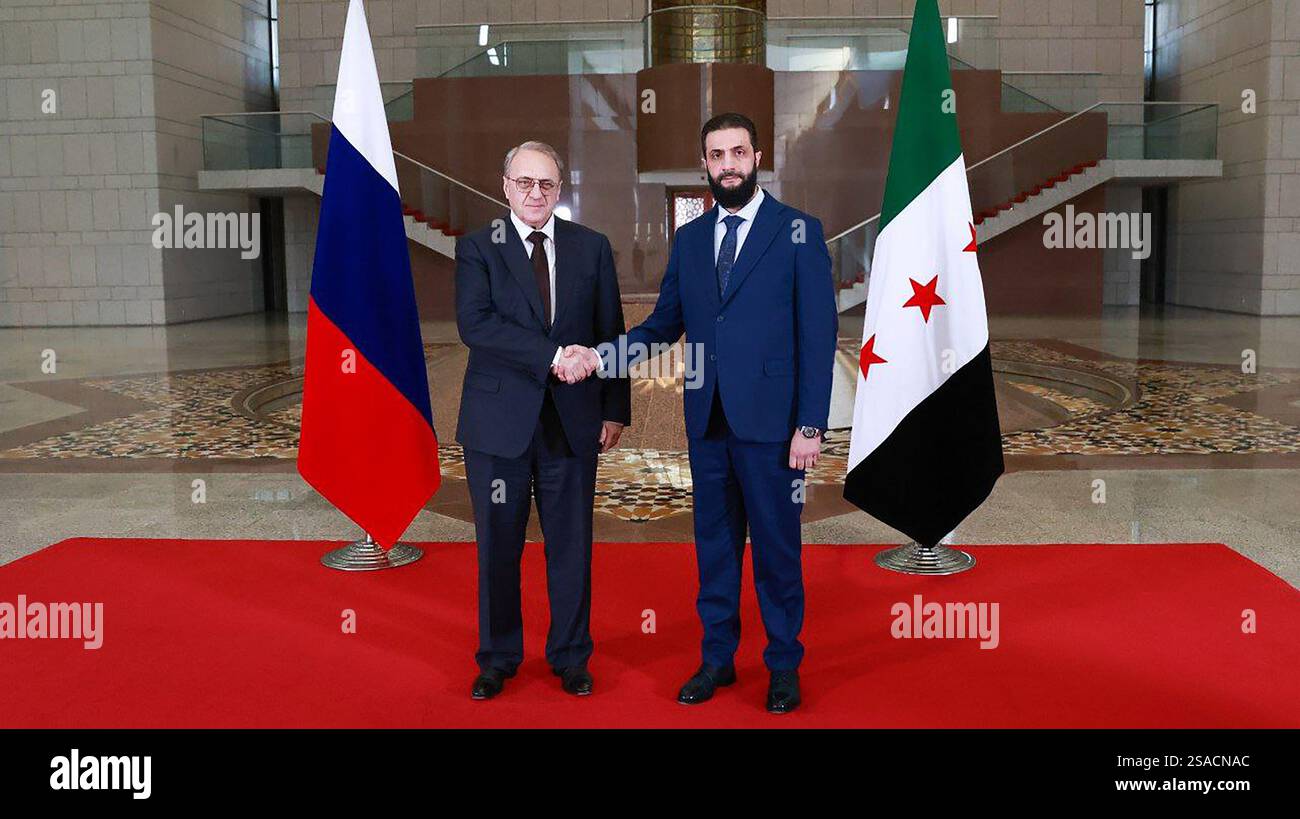 Damascus, Syria. 29th Jan, 2025. Syria's new leader Ahmed al-Sharaa (R ...