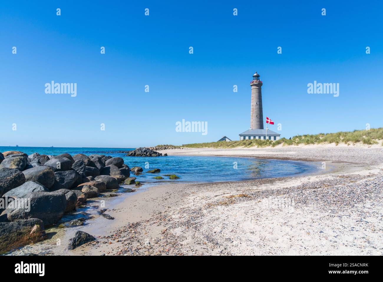 The Lighthouse Skagen Fyr at Grenen at the most northern tip of Denmark ...