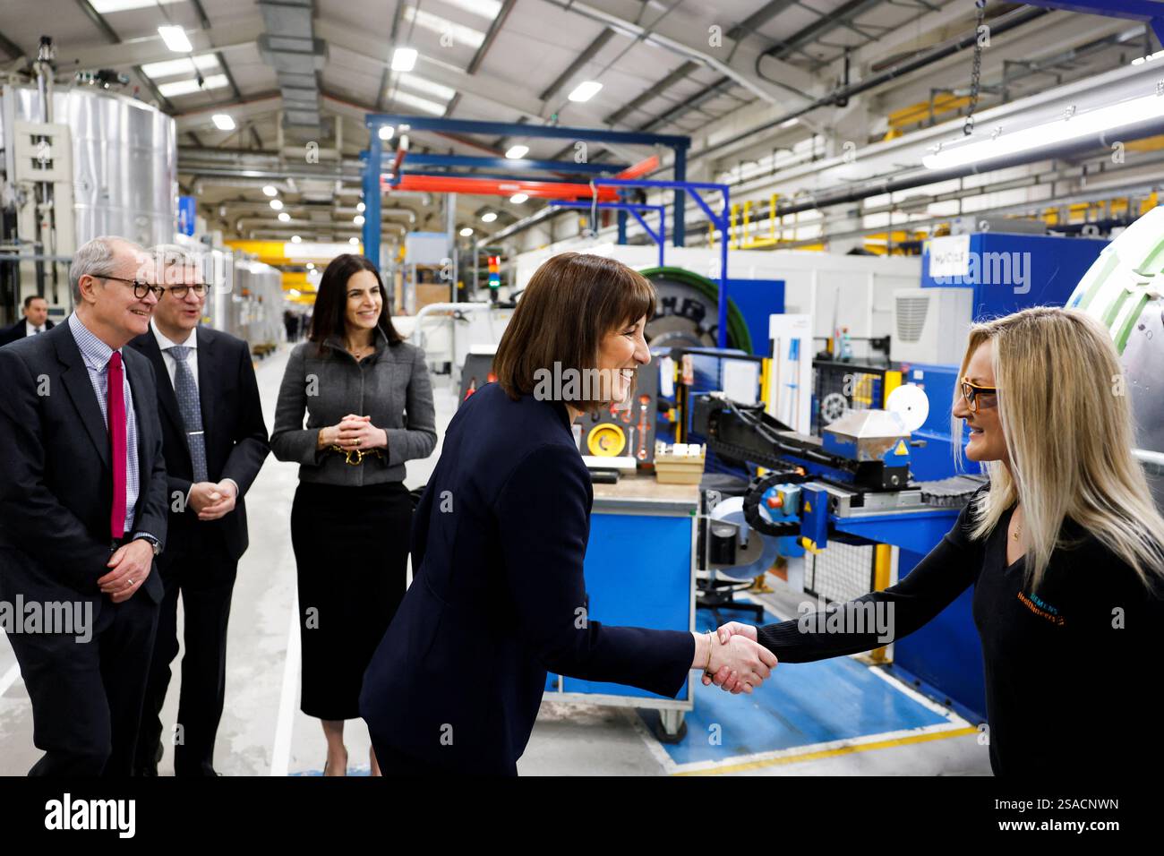 Chancellor Rachel Reeves shakes hands with a Siemens' employee during a ...