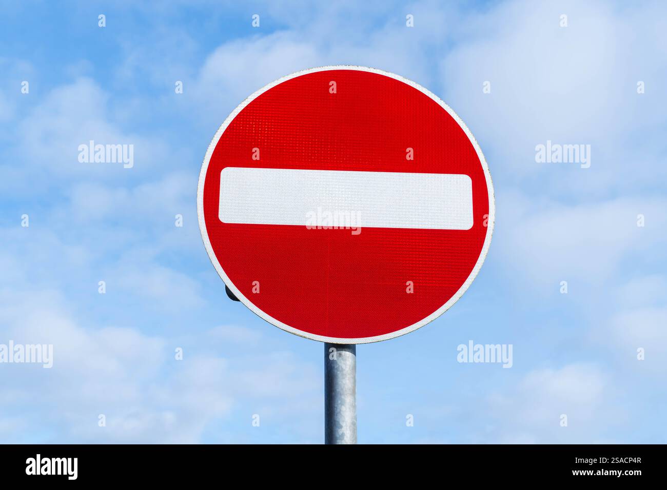 UK Traffic sign stating No Entry to a road with a red circle and white ...