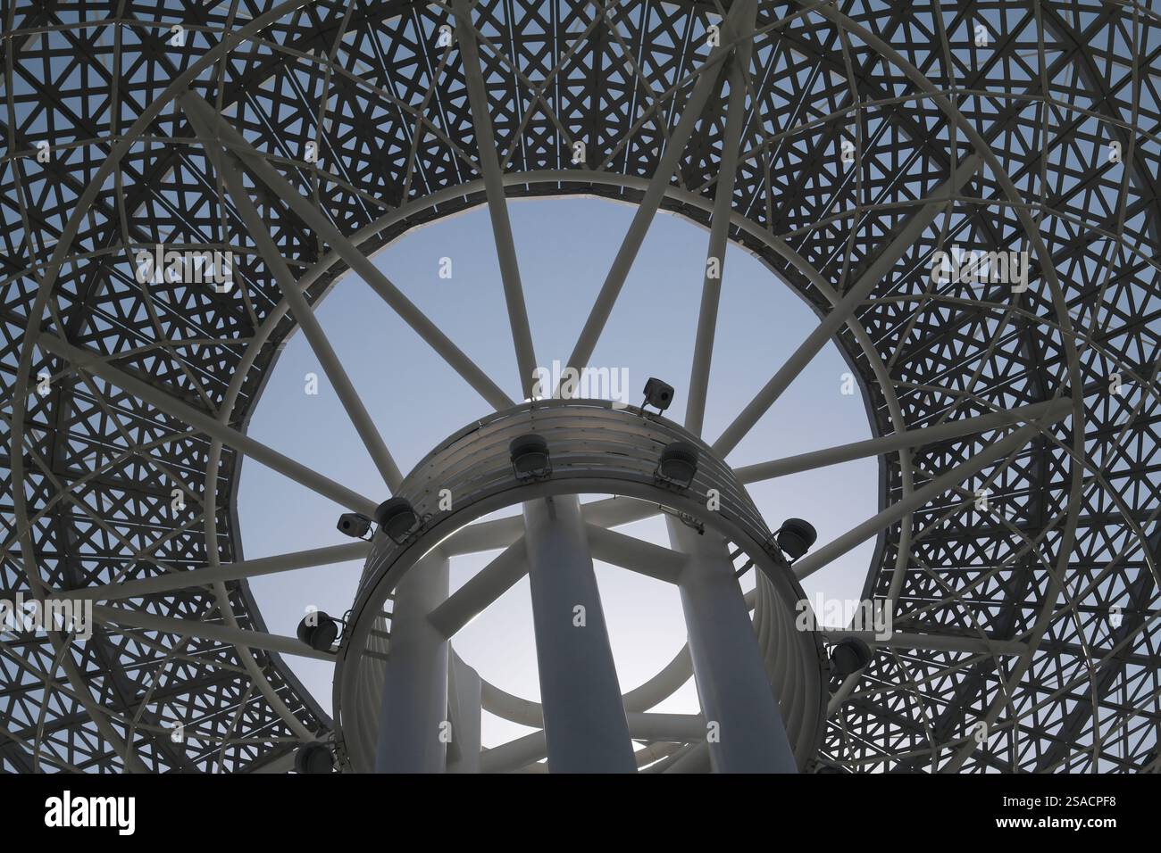 Modern artificial tree constructions and shopping street on Dubai ...