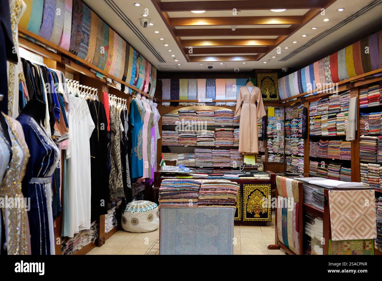 Traditional arabic women dress cloth displayed in an oriental shop ...