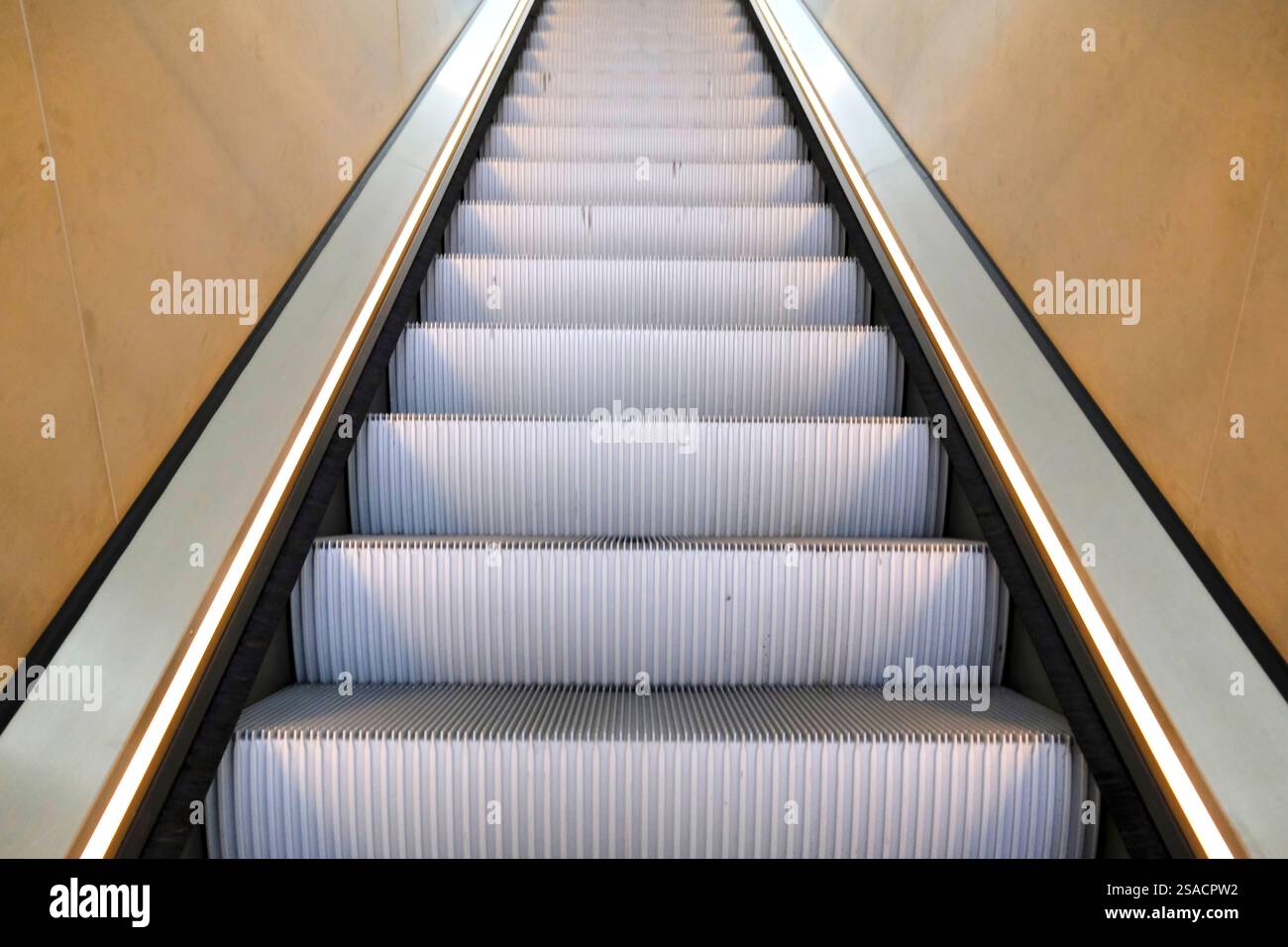 Empty electric escalator. Perspective and symmetry concept. Regensburg ...