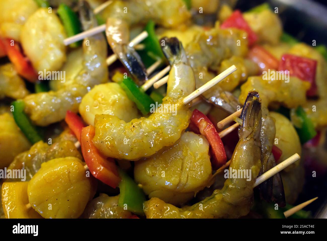 Skewers of prawns and scallops. Seafood Stock Photo - Alamy