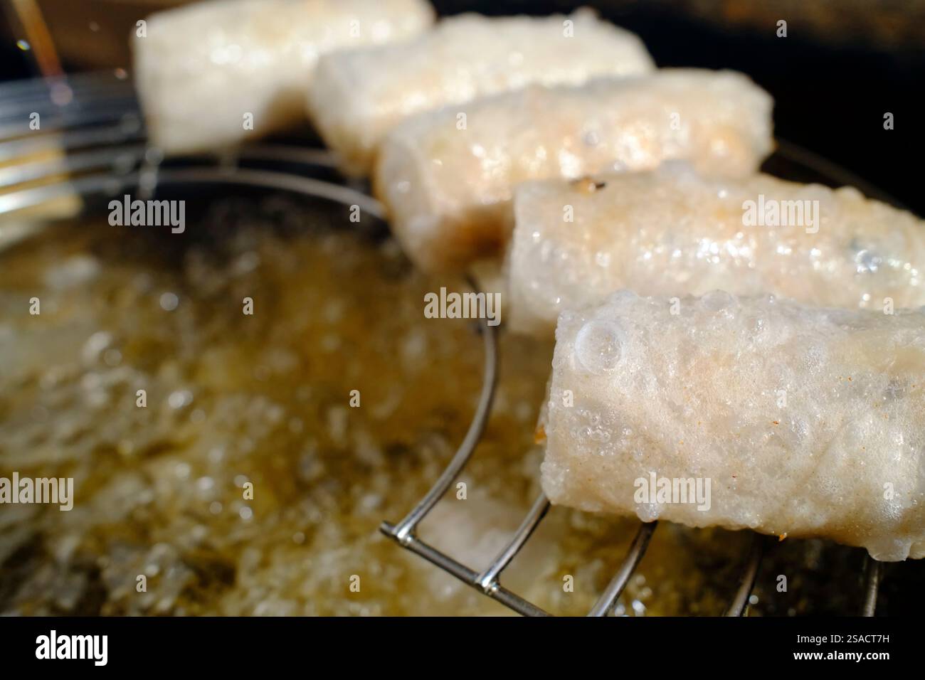 Making traditional Vietnamese pork spring rolls. Street food Stock ...
