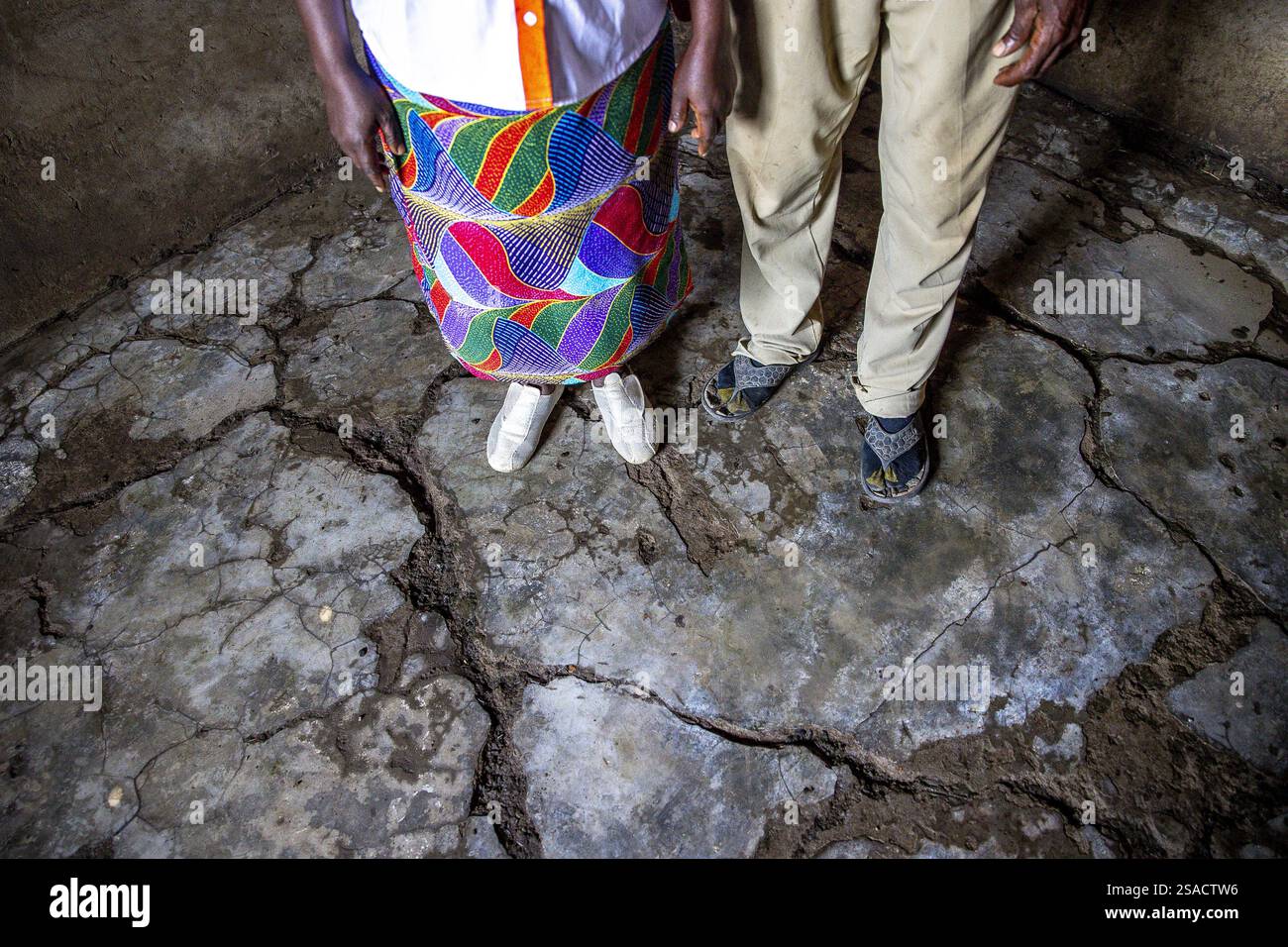 Couple standing in their home damaged by flooding in Kilimambogo, Kenya ...