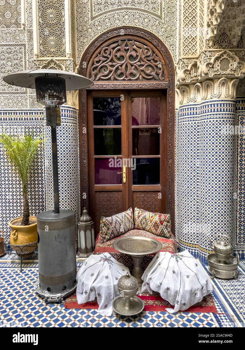 Sitting space in the courtyard of a riad in Fes, Morocco Stock Photo ...