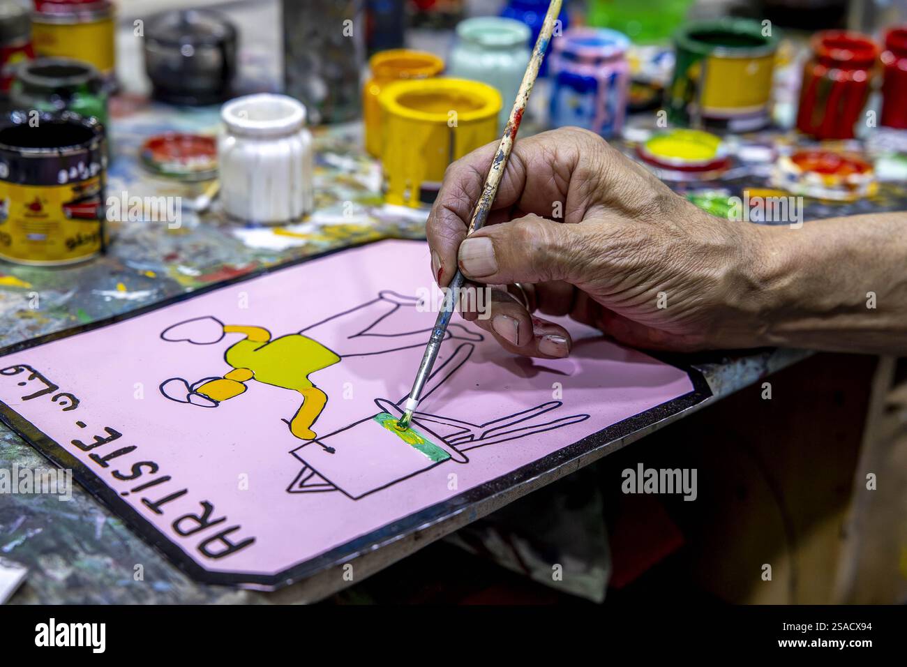 Sign painter at work in Marrakesh, Morocco Stock Photo - Alamy