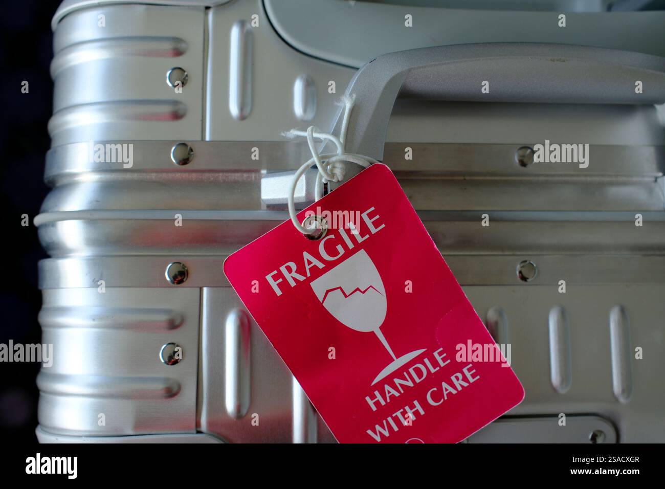 Metal suitcase with a fragile label. Air travel. Kuala Lumpur, Malaysia ...