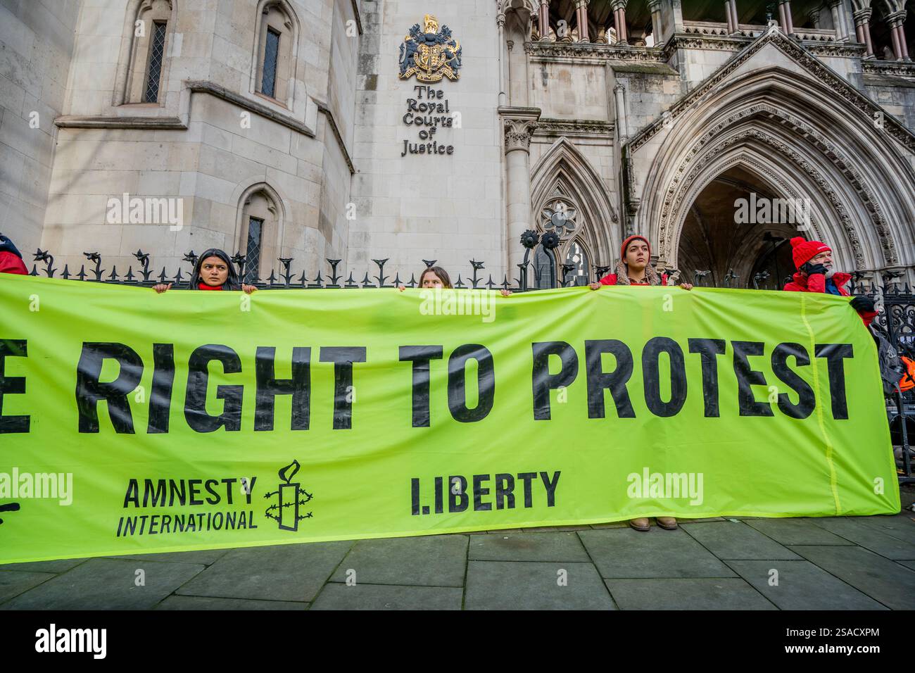 London, UK. 29th Jan, 2025. Protesters hold a banner during the ...