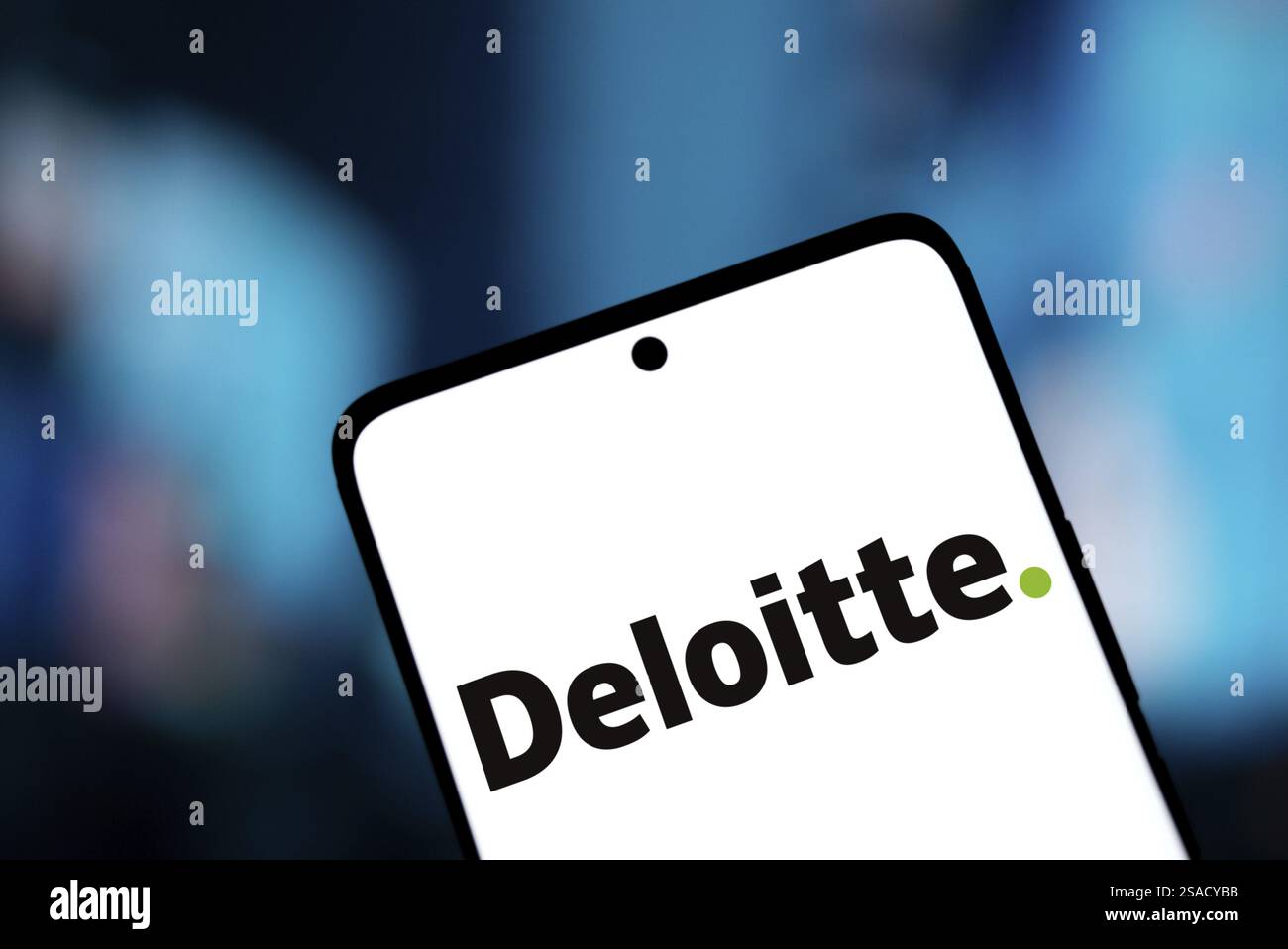 Deloitte logo is displyed on smartphone. Deloitte is a multinational ...