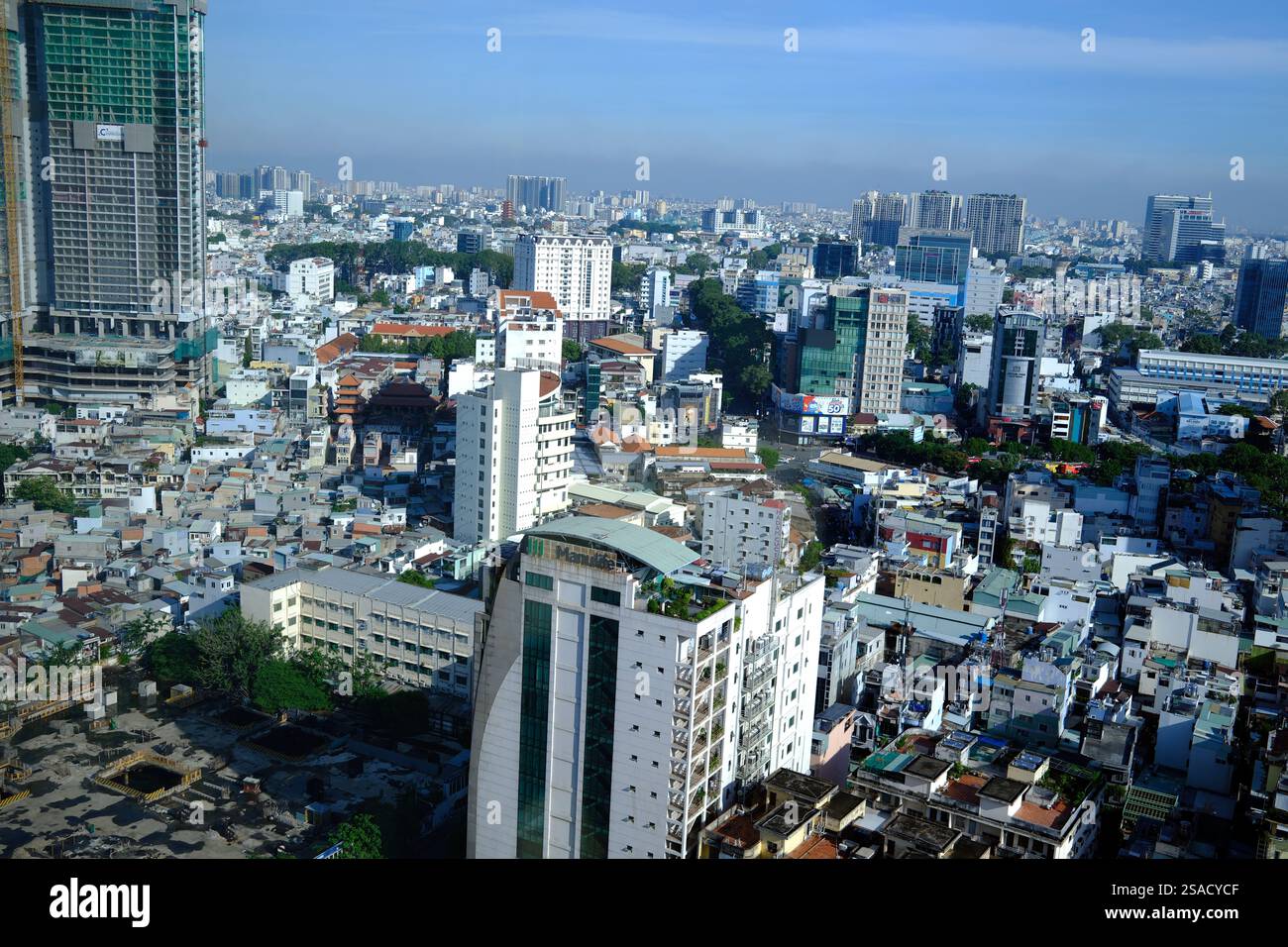 Ho Chi Minh city (or Saigon) skyline with colorful house. Saigon is the ...