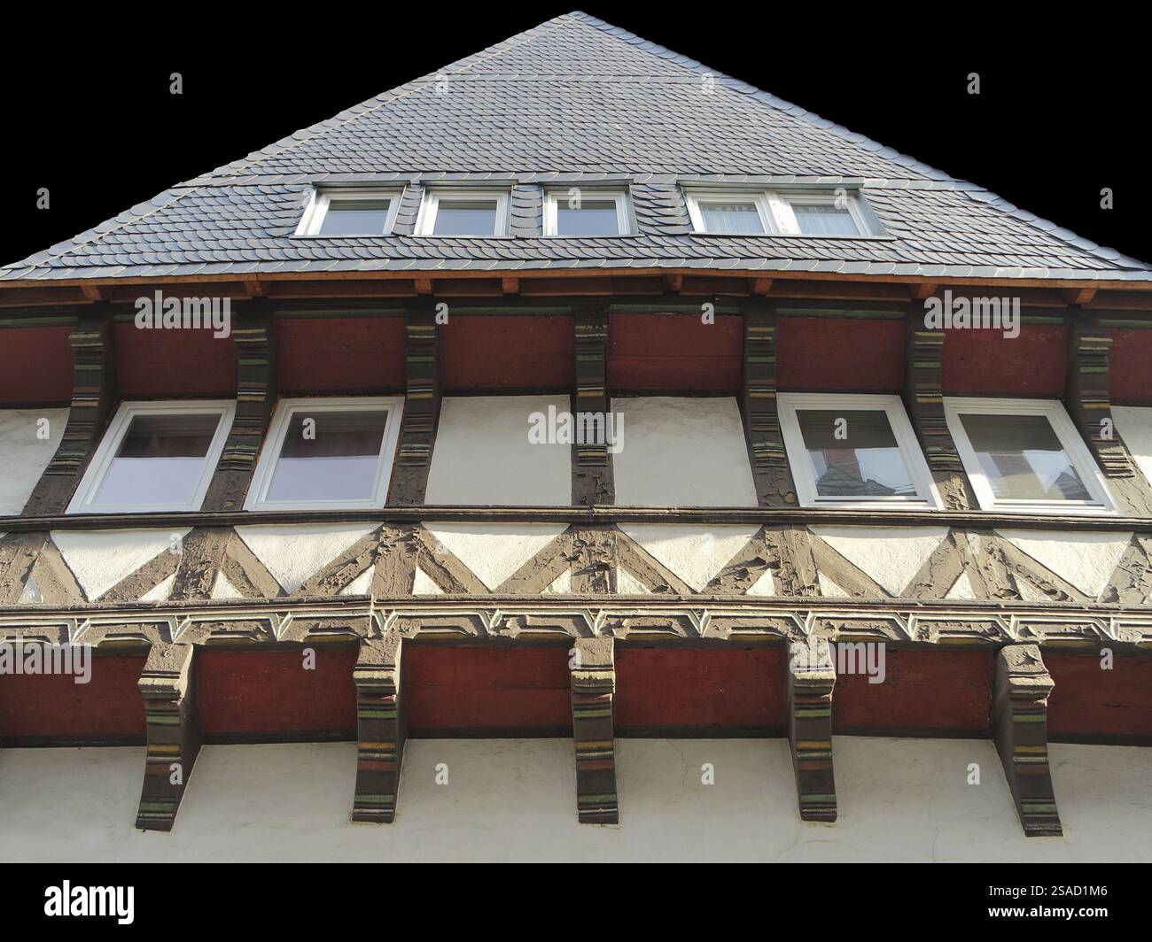 Half-timbered house gable with slate roof Stock Photo - Alamy