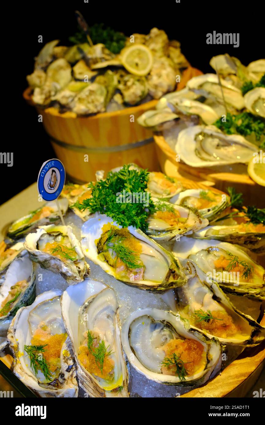Seafood buffet in a restaurant. Fresh oysters Stock Photo - Alamy