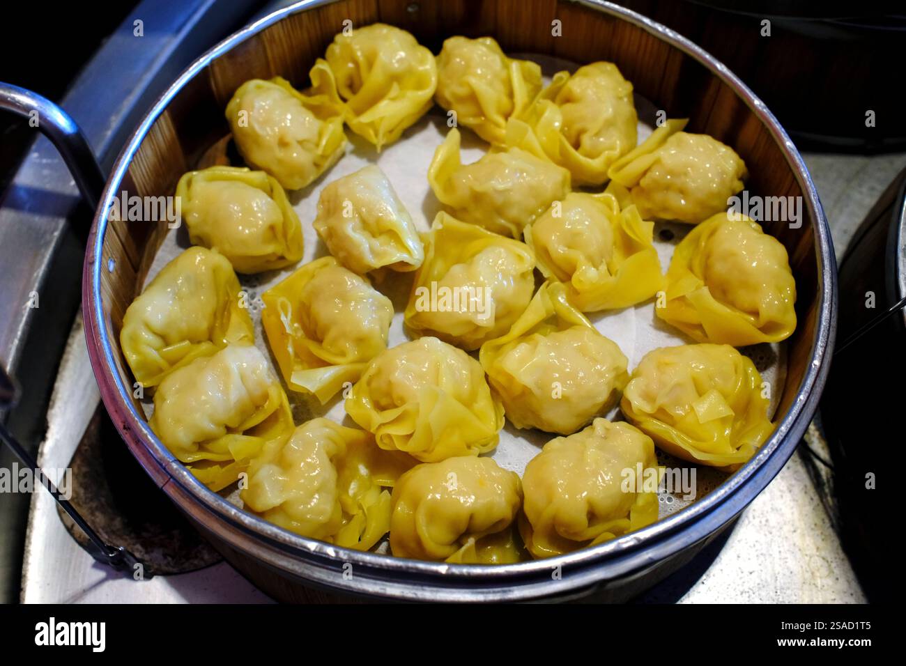 Dim sum and dumpling buffet in a restaurant. Steamer baskets Stock ...