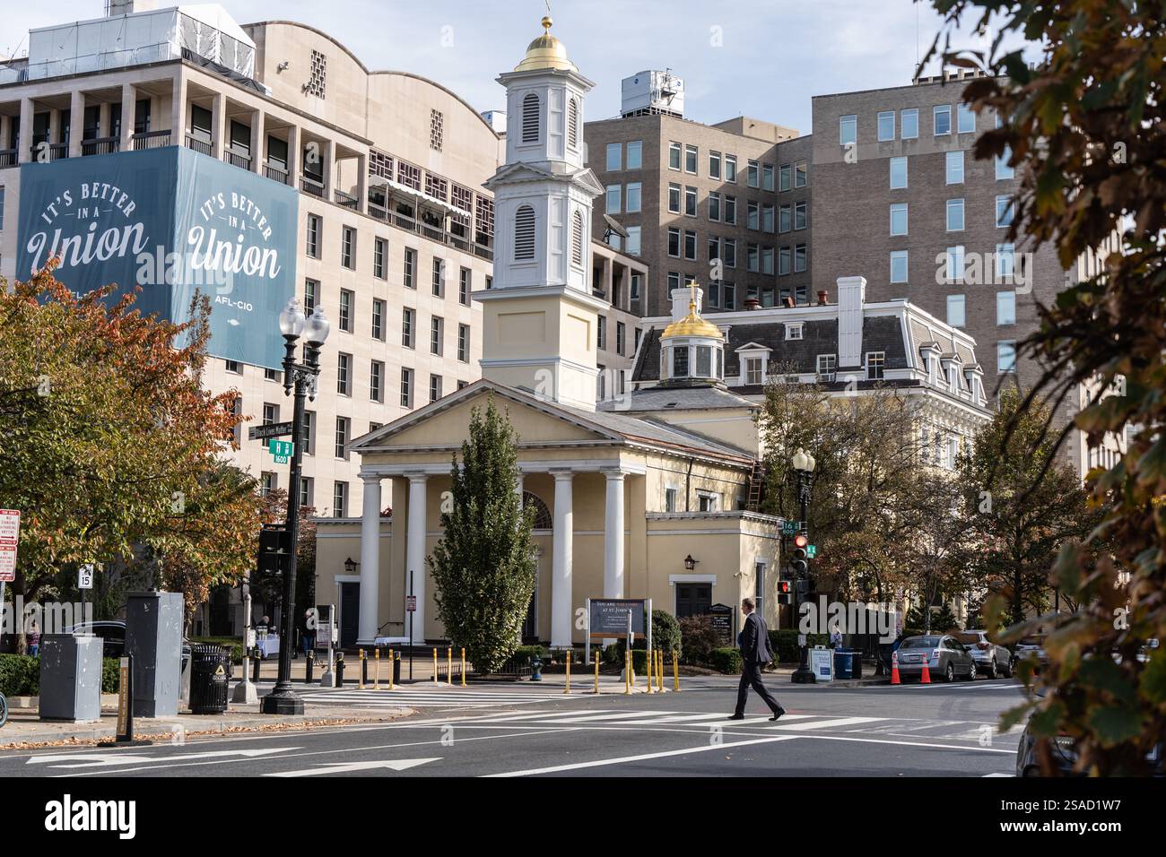 Washington DC – October 26, 2024: Man crosses street in front of Saint ...