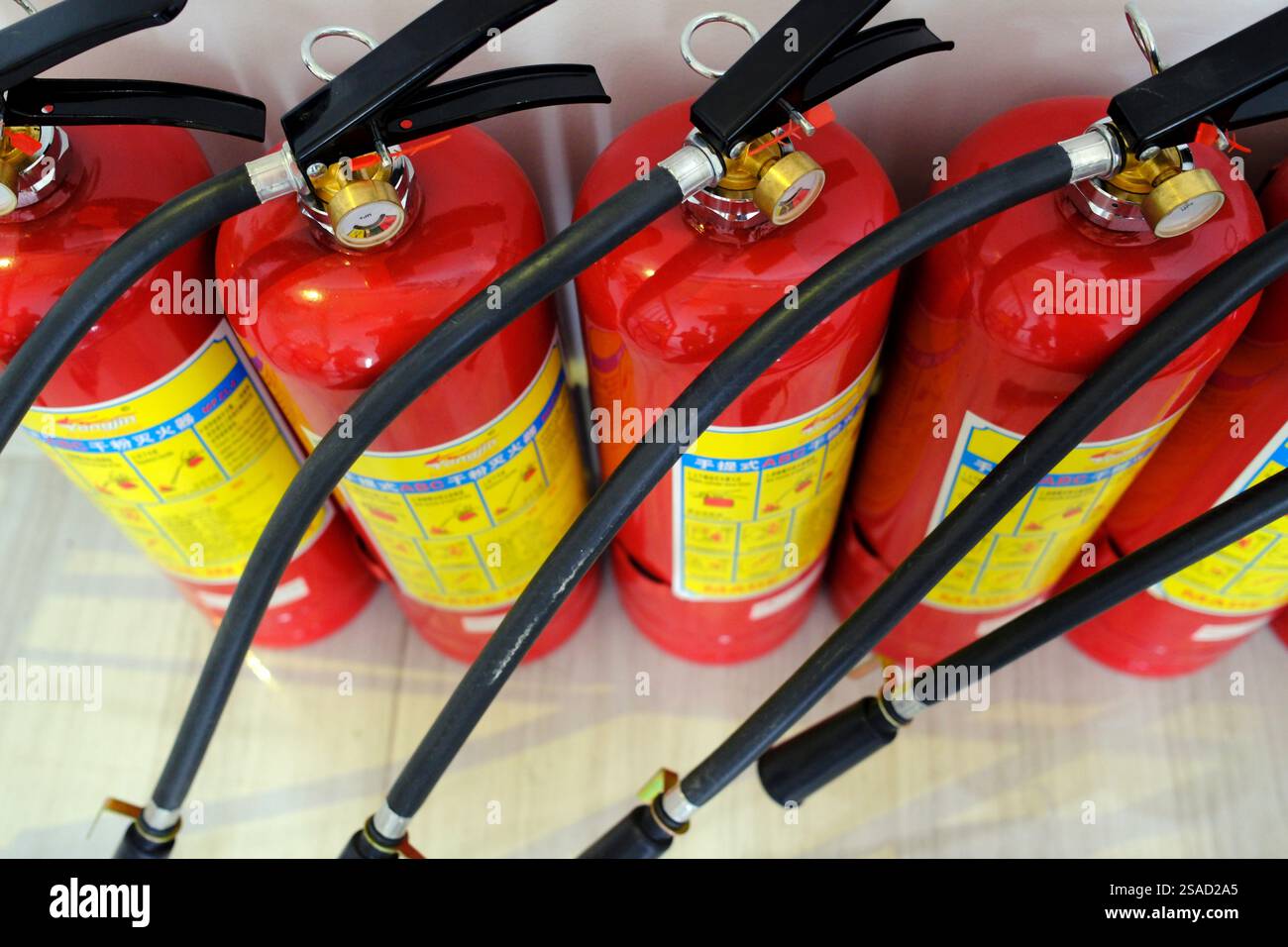 Fire extinguishers in the lobby of a hotel Stock Photo - Alamy