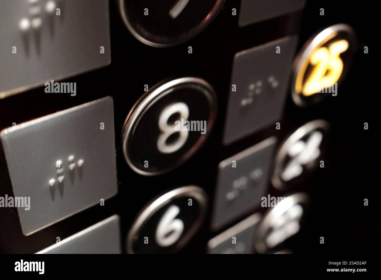 Button in the elevator with Braille code for blind people Stock Photo ...
