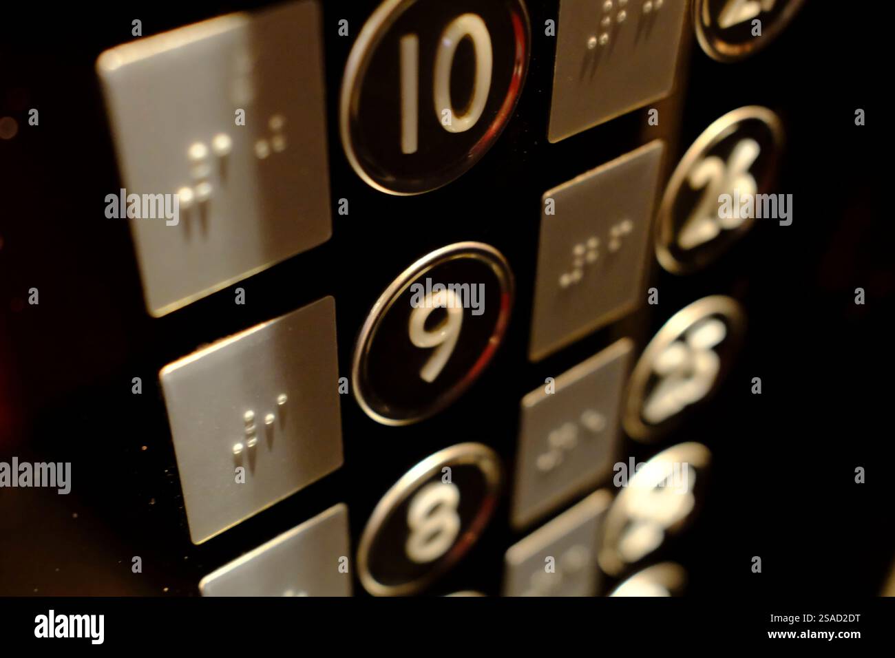 Button in the elevator with Braille code for blind people Stock Photo ...