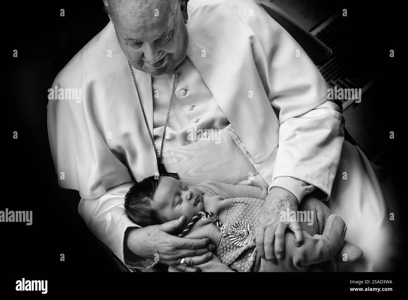 January 29, 2025, Vatican City, Italy: POPE FRANCIS holds a sleeping ...