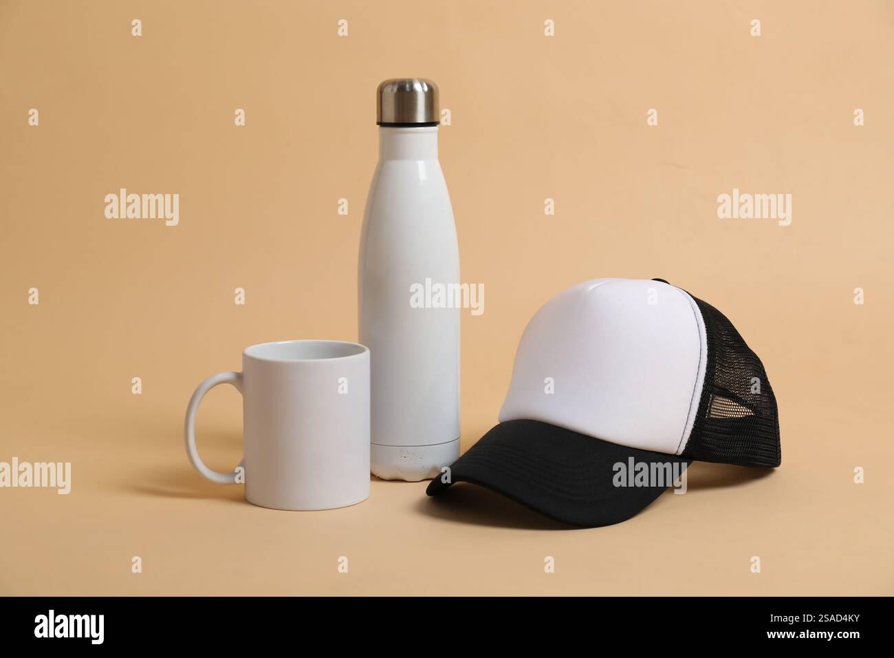 Different blank items for branding on beige background. Mockup for ...