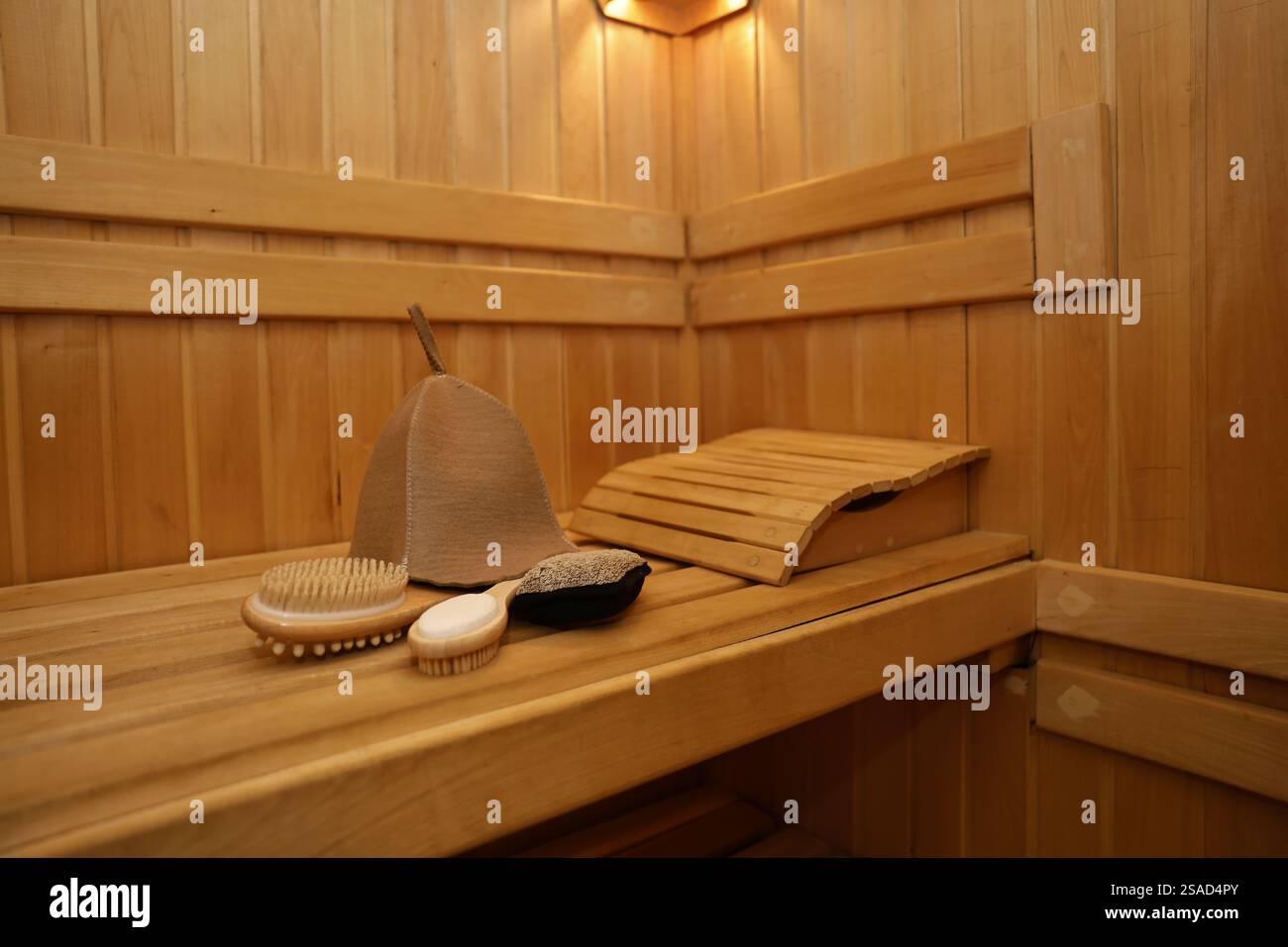Felt wool hat and bath accessories on wooden bench in sauna Stock Photo ...